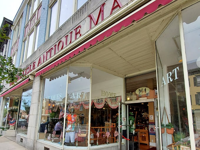 The iconic red awning of Carlisle Antique Mall beckons treasure hunters like a vintage siren song to downtown Carlisle's historic district.