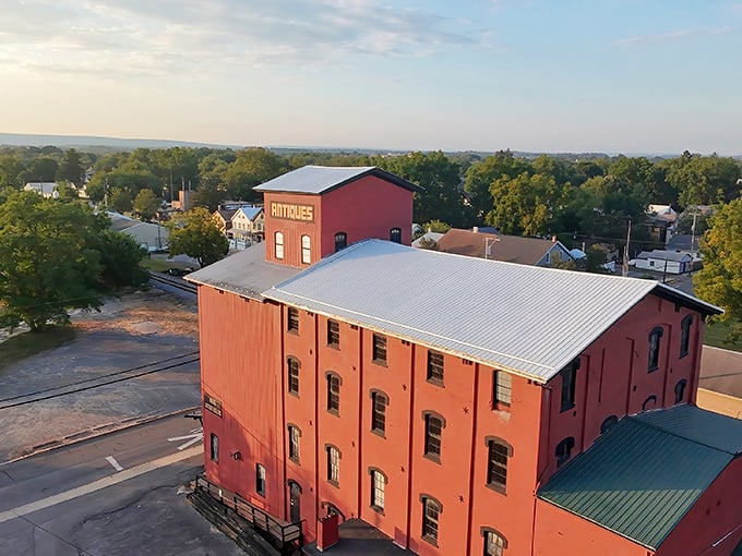 From this angle, you can see how the former mill dominates the Lewisburg landscape. That "ANTIQUES" sign isn't kidding—it's a siren call to collectors everywhere.