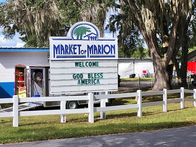 The iconic welcome sign stands sentinel beneath Spanish moss-draped oaks, promising treasures within that'll make your wallet only slightly lighter than your spirits.