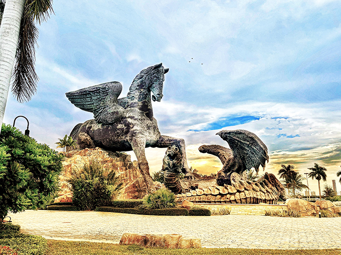 Epic mythological showdown! The massive Pegasus and Dragon statue commands attention against Florida's blue sky, making ordinary roadside attractions seem positively miniature.