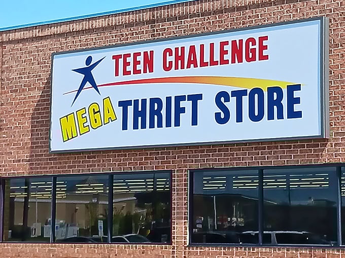 The iconic storefront beckons with its bold promise of "MEGA" treasures. Like a thrift store Narnia, what adventures await beyond those brick walls?