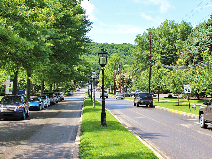 Those aren't just any street lamps—they're genuine gas lamps that have illuminated Wellsboro's evenings since the 19th century.