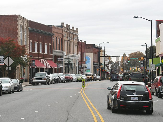 Main Street's parade of vintage storefronts feels like stepping into a Norman Rockwell painting where the Wi-Fi actually works.