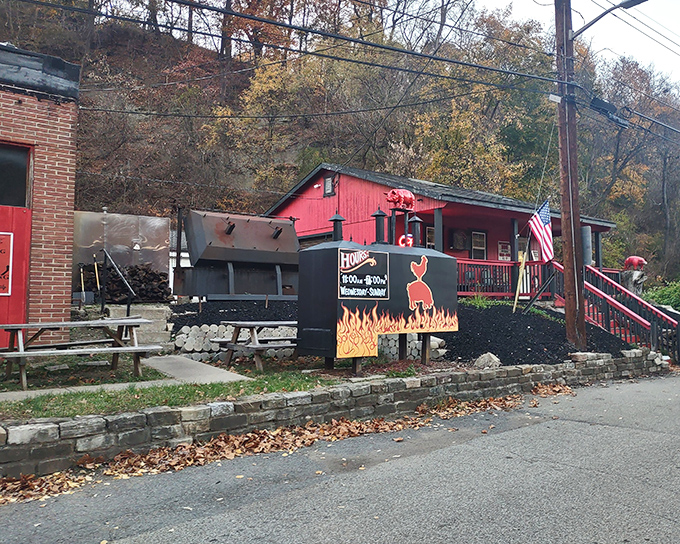 Where there's smoke, there's barbecue magic. The outdoor smoker and woodpile aren't just equipment—they're the beating heart of Pittsburgh BBQ's operation.