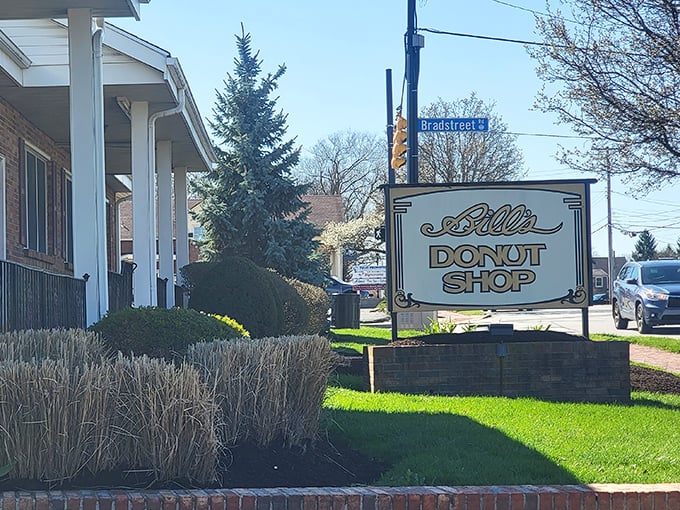 The iconic sign at Bill's Donut Shop stands like a beacon of sweetness on Bradstreet Road, promising delicious memories in every bite.