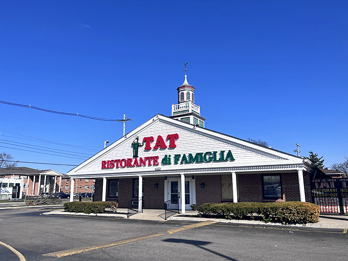 The iconic white facade with red and green lettering isn't just a restaurant sign—it's a beacon of Italian comfort that's been calling Columbus diners home for generations.