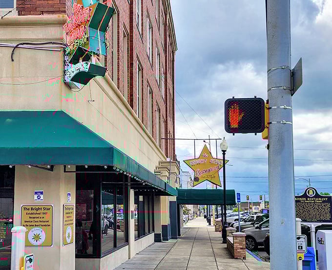 The iconic star-shaped sign glows against a sunset sky, beckoning hungry travelers like a culinary lighthouse on Bessemer's main street.
