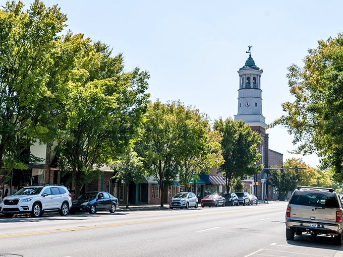 Broad Street's iconic clock tower stands sentinel over Camden like a Southern grandfather keeping watch, reminding everyone that some places still value taking their sweet time.