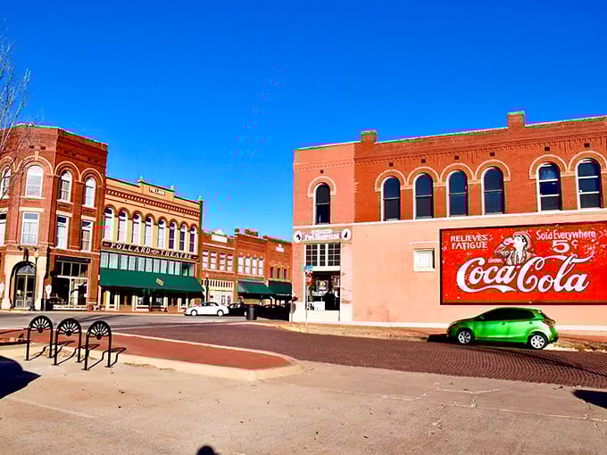 Downtown Guthrie's main drag looks like a movie set, except the Coca-Cola sign is real and so is the charm.