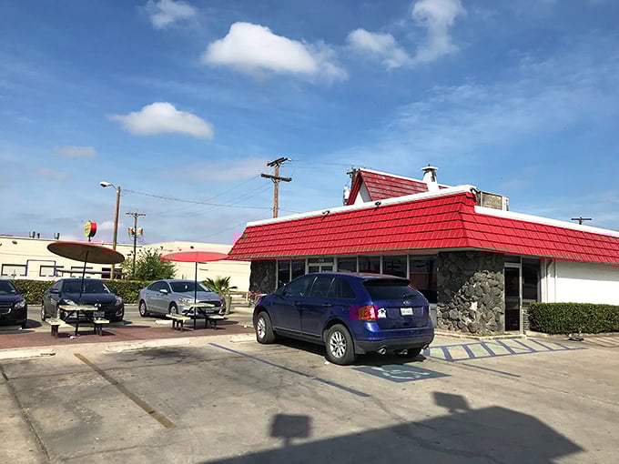 From another angle, Griff's distinctive silhouette promises comfort food salvation. That stone facade has witnessed decades of burger cravings being gloriously satisfied.