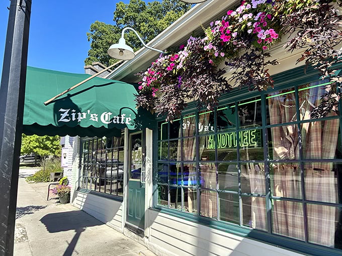 The green awning and vibrant flower boxes aren't just decoration – they're Cincinnati's equivalent of a welcome mat saying "come hungry, leave happy."