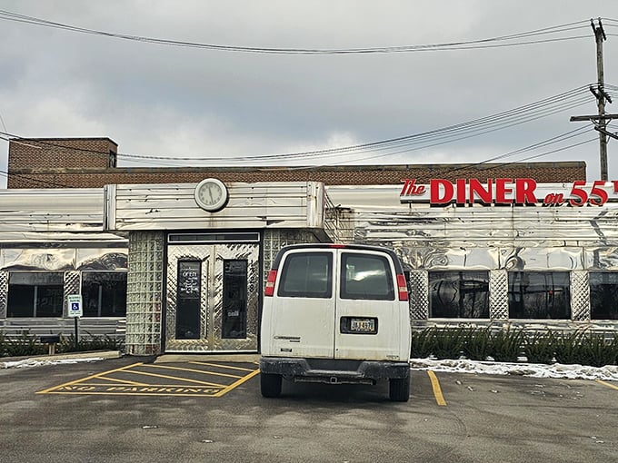 The classic American diner exterior beckons with its silver-sided charm, promising comfort food and conversations that matter.