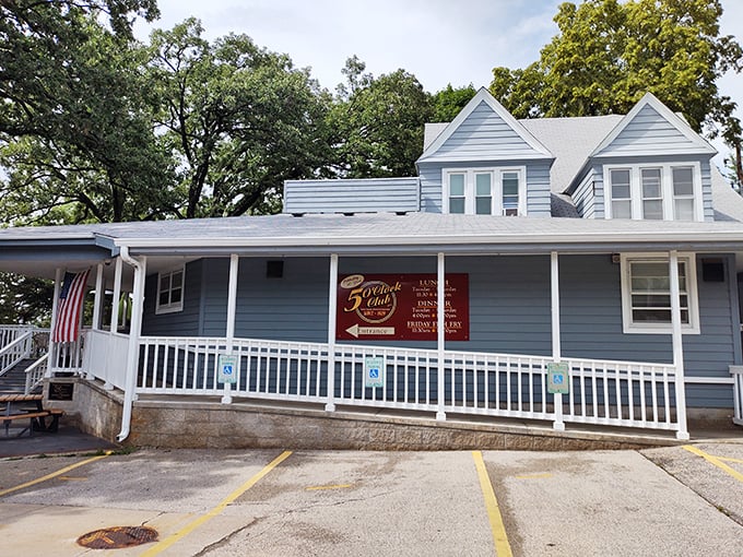The blue cottage-like exterior of The 5 O'Clock Club welcomes you like an old friend, promising comfort and deliciousness behind its unassuming façade.