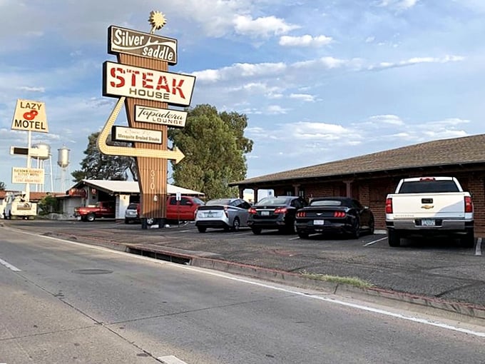 That retro sign isn't just nostalgic decoration – it's a beacon guiding hungry souls to beef nirvana.