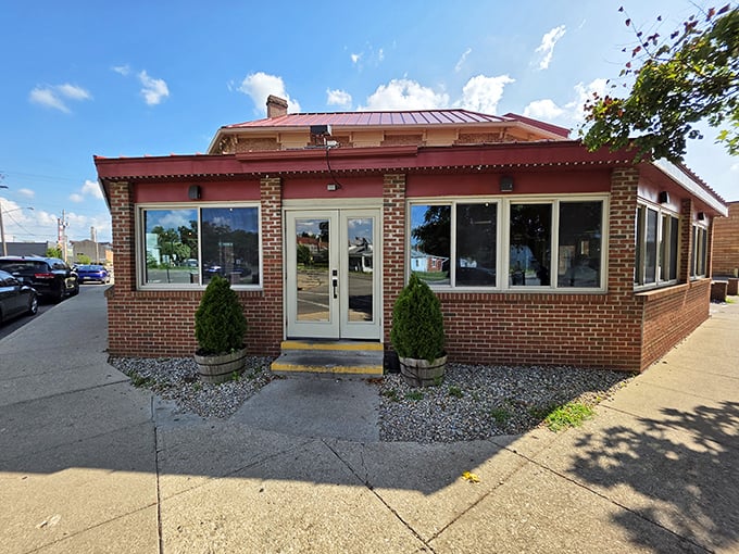 The unassuming brick exterior of Old Canal Smoke House proves once again that the best BBQ joints don't need fancy facades to serve extraordinary food.