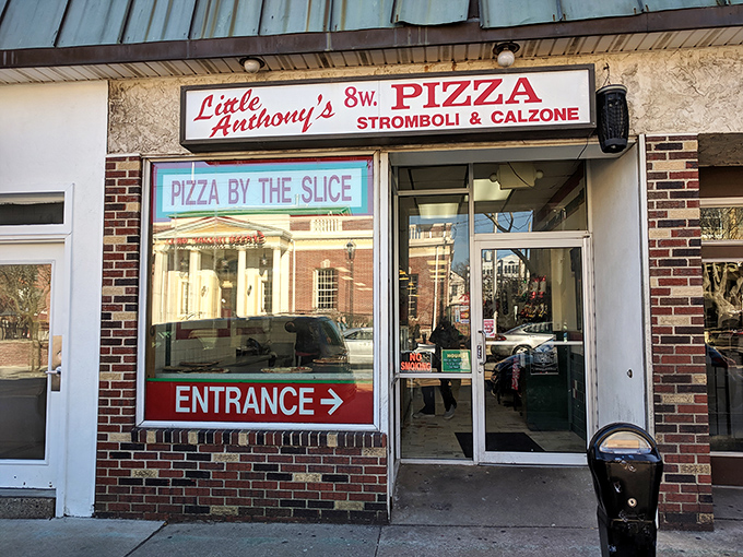 The unassuming storefront of Little Anthony's beckons pizza lovers with its classic red and white signage—proof that culinary treasures often hide in plain sight.
