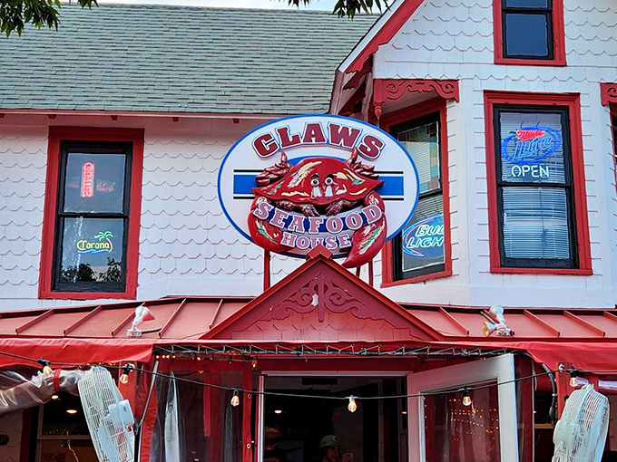 That unmistakable sign featuring a giant red crab isn't just decoration—it's a promise of the oceanic delights waiting inside this Rehoboth Beach institution.