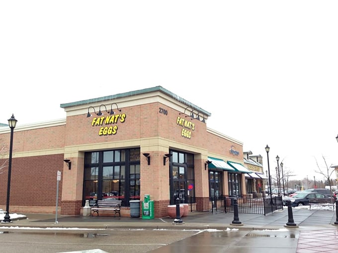 The brick façade of Fat Nat's stands like a breakfast beacon on a winter morning, promising warmth and hollandaise inside.