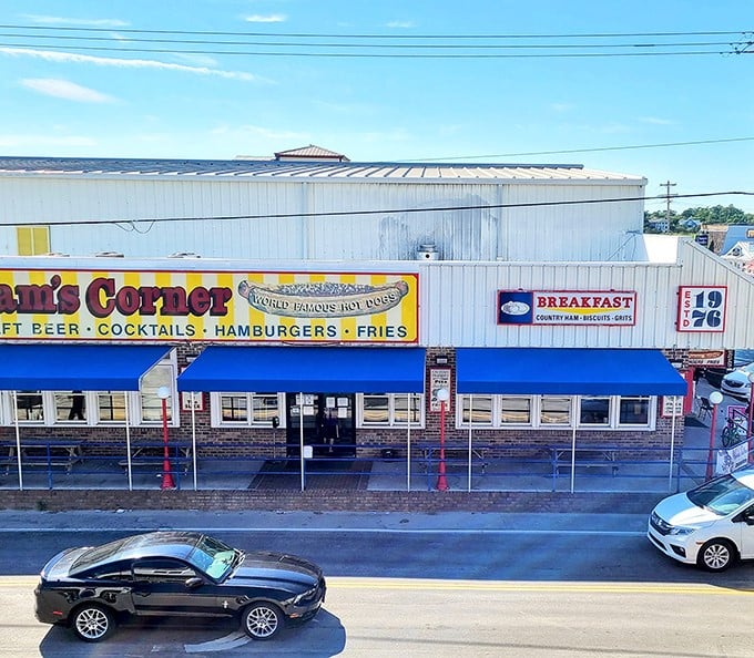 That yellow and blue facade isn't just a building—it's a portal to burger paradise where beach memories are made one patty at a time.