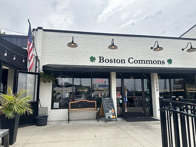 The white-brick façade with green shamrocks flanking the Boston Commons sign promises a taste of New England that feels delightfully out of place in Nashville.