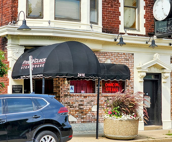 The iconic black awning beckons like an old friend, promising carnivorous delights behind that brick façade. Milwaukee's meat mecca awaits.