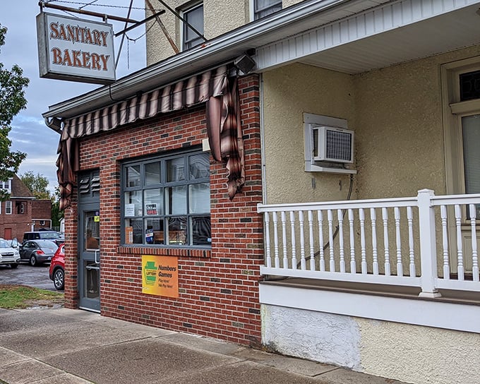 Another angle reveals the charming storefront with its classic awning—proof that the best bakeries don't need fancy facades when what's inside is this good.
