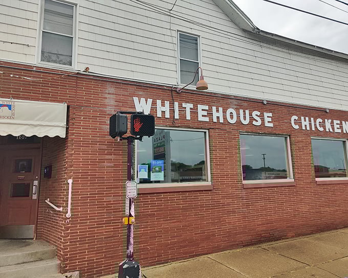 The brick facade of White House Chicken stands as a no-nonsense monument to fried poultry perfection in Barberton, where culinary legends are born without fancy frills.