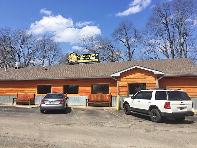 The unassuming wooden exterior of Squealers hides barbecue greatness like a poker player with four aces – no tell, all payoff.