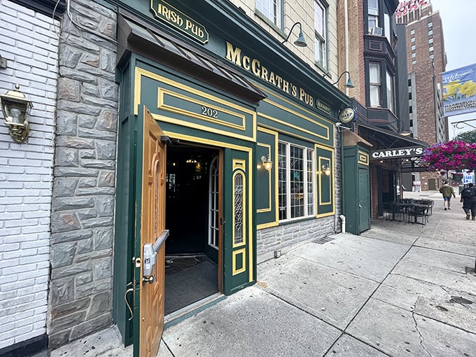 The emerald-hued façade of McGrath's Pub stands like a Celtic beacon on Harrisburg's Locust Street, promising authentic Irish comfort within those wooden doors.