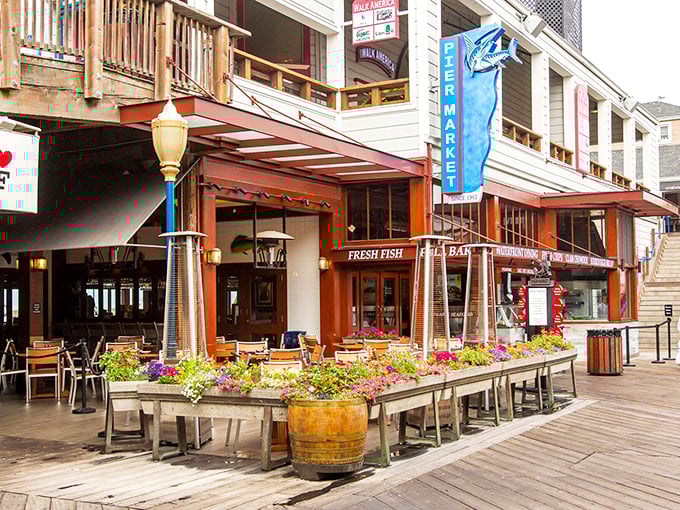 Pier Market's inviting wooden façade welcomes seafood lovers with colorful flower boxes and that unmistakable maritime charm. San Francisco's waterfront dining at its most photogenic.
