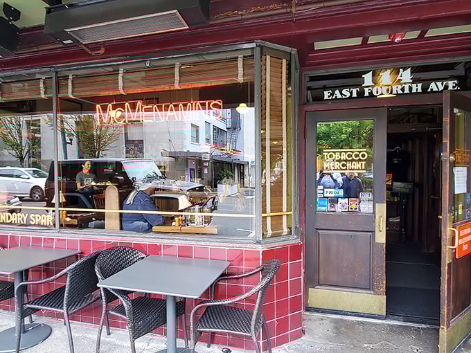 The iconic red-tiled exterior of McMenamins Spar Café beckons like an old friend on Olympia's East Fourth Avenue. That neon glow promises good things inside.