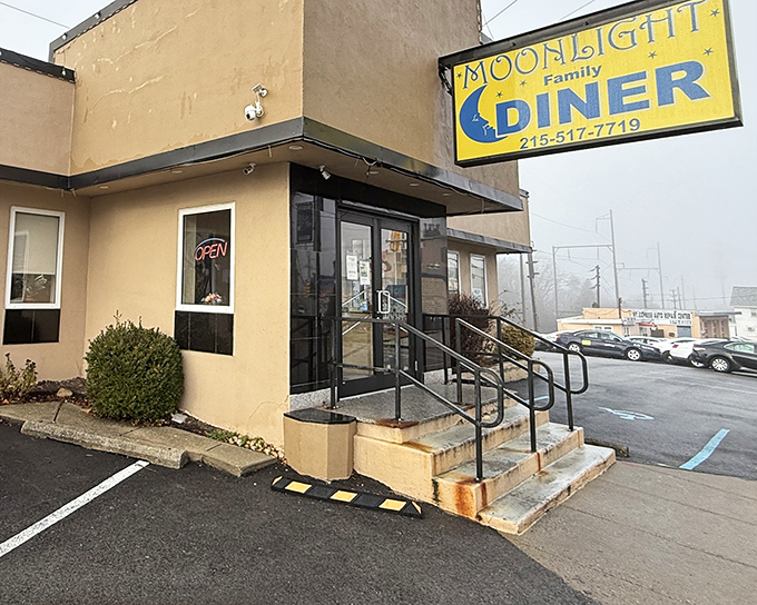 Morning fog can't dim the welcoming yellow sign—this unassuming entrance has greeted hungry Pennsylvanians through countless seasons.