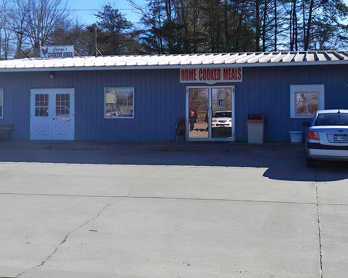 The unassuming blue exterior of Cheryl's Country Diner promises what flashy establishments can't deliver – authentic home cooking that speaks directly to your soul. 