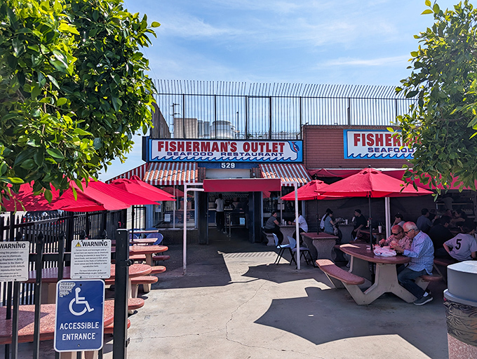 That classic red-and-white striped awning isn't just charming—it's a beacon calling seafood lovers from miles around.
