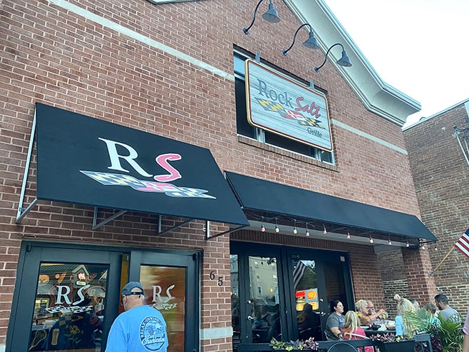 RockSalt's exterior showcases that perfect blend of Main Street charm and culinary seriousness – note the "Raw Bar" sign, nature's way of saying "good things ahead."