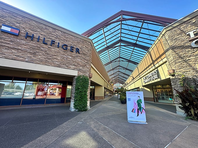 The covered walkways at Woodburn Premium Outlets aren't just practical for Oregon's rainy days—they're architectural eye candy that makes bargain hunting feel positively civilized.