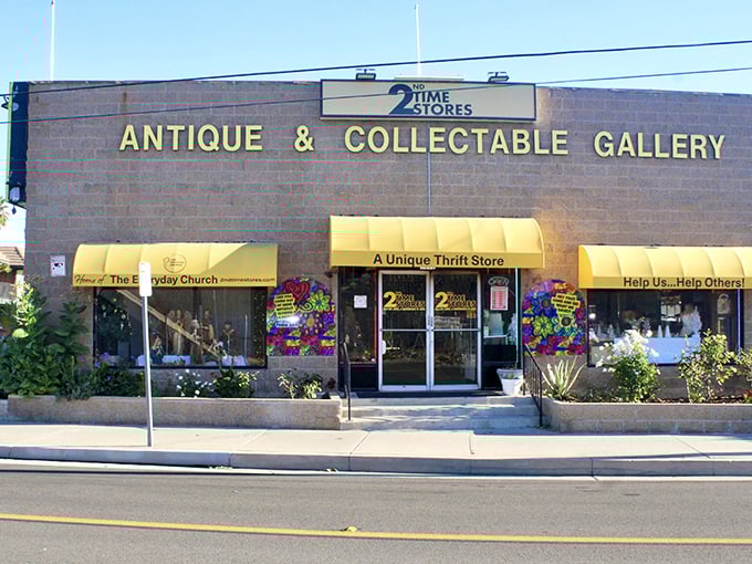 Those cheerful yellow awnings aren't just decoration—they're basically waving at your wallet, promising thrift store adventures ahead.