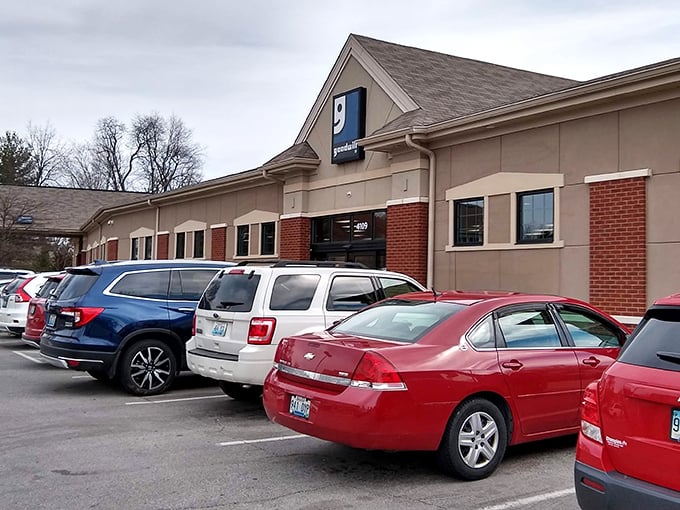 The unassuming exterior of Goodwill on Taylorsville Road hides a treasure trove within—like finding a gourmet meal at what looks like a greasy spoon.