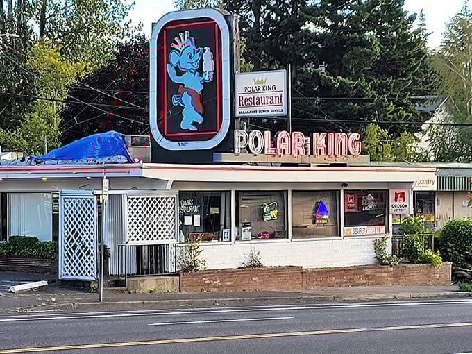 The blue boxing bear welcomes you to Polar King, where nostalgia isn't manufactured—it's earned through decades of serving comfort food that actually comforts.