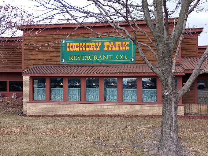 The rustic brick-and-wood exterior of Hickory Park stands proudly in Ames—a legendary barbecue haven that’s satisfied generations of hungry travelers.