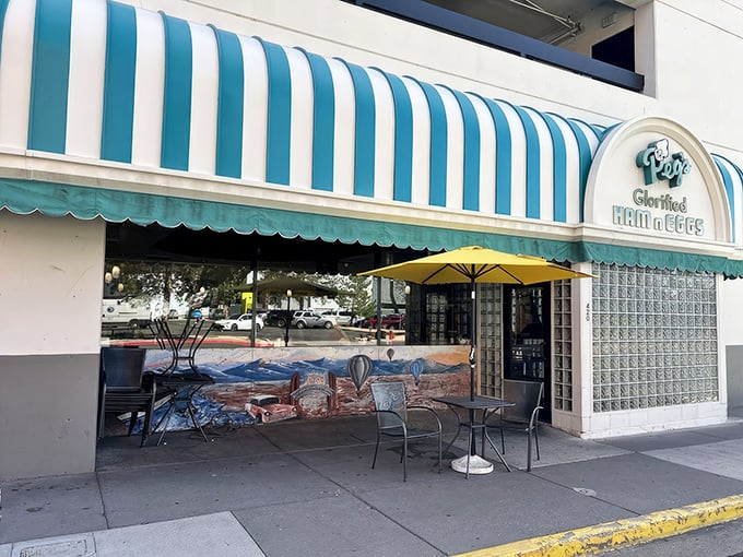 That iconic blue and white striped awning isn't just eye-catching—it's a beacon of breakfast hope for hungry Reno locals seeking morning salvation.