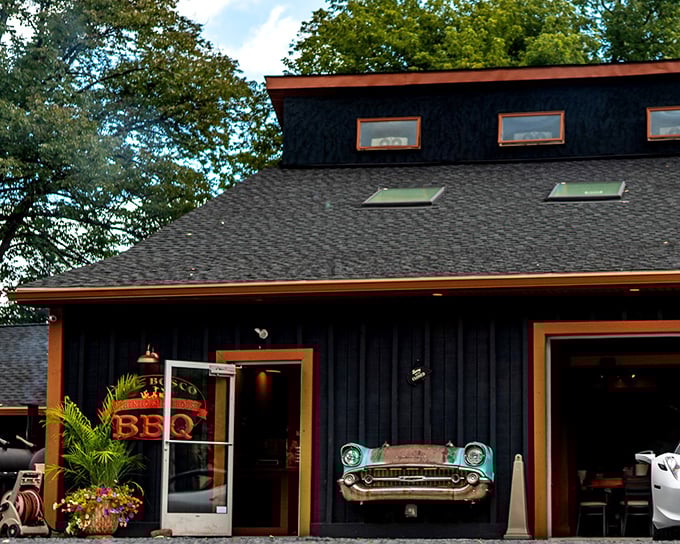 That vintage Chevy front end mounted on the building isn't just decoration—it's a promise that this place respects the classics, automotive and culinary alike.