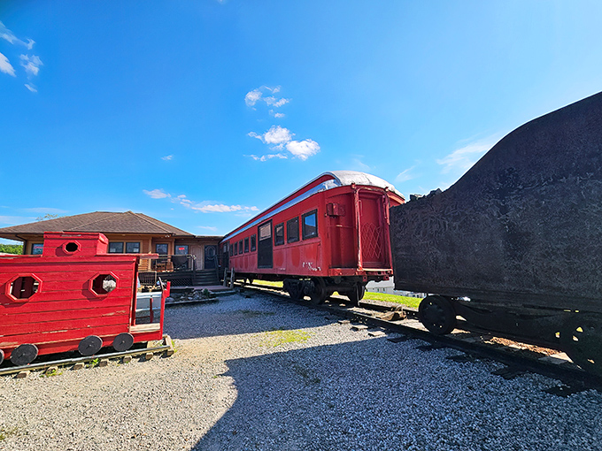 Where dining meets nostalgia – the vibrant red dining car and caboose create an unmistakable landmark that's impossible to miss from the highway.
