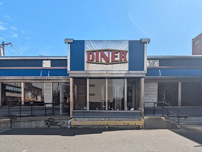 That classic blue facade isn't trying to be retro—it just is. Some architectural decisions are too perfect to need updating.