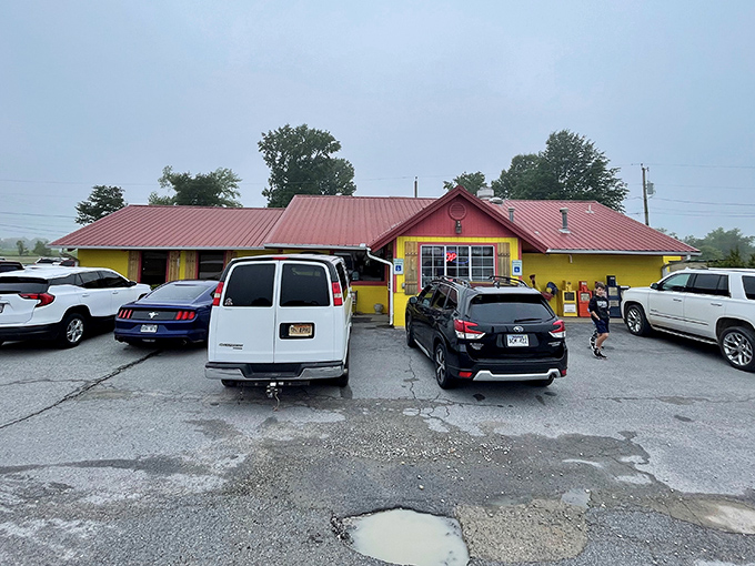 The bright yellow exterior with its red roof isn't trying to win architectural awards—it's saving all its energy for what matters: the food inside.