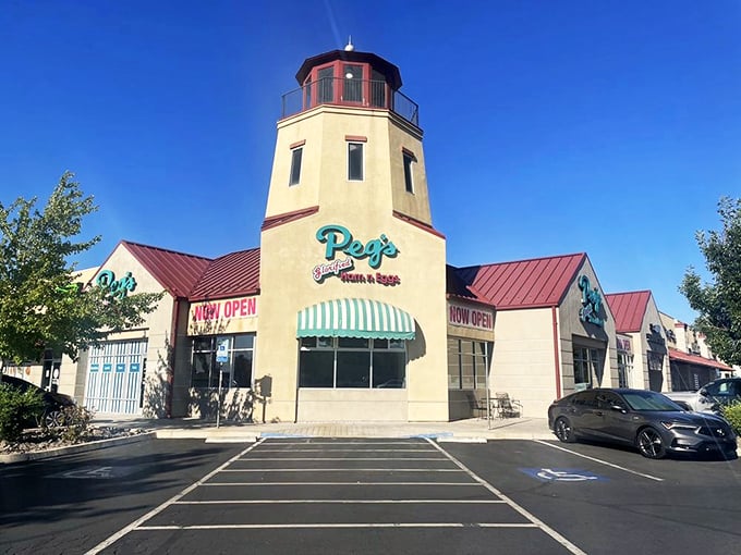 The lighthouse-shaped tower isn't just architectural whimsy—it's a beacon guiding hungry souls to breakfast paradise in Sparks.