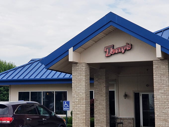 Tony's iconic blue roof stands like a culinary lighthouse in Findlay, beckoning hungry travelers with its simple promise of exceptional comfort food.