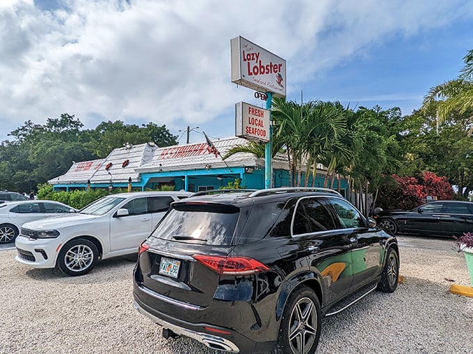 A different angle reveals the restaurant's cheerful exterior and "Fresh Local Seafood" sign – the Keys equivalent of finding a treasure map.
