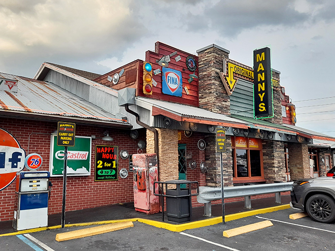 The unmistakable facade of Manny's Original Chophouse stands as a beacon to hungry travelers, promising carnivorous delights behind those rustic walls.
