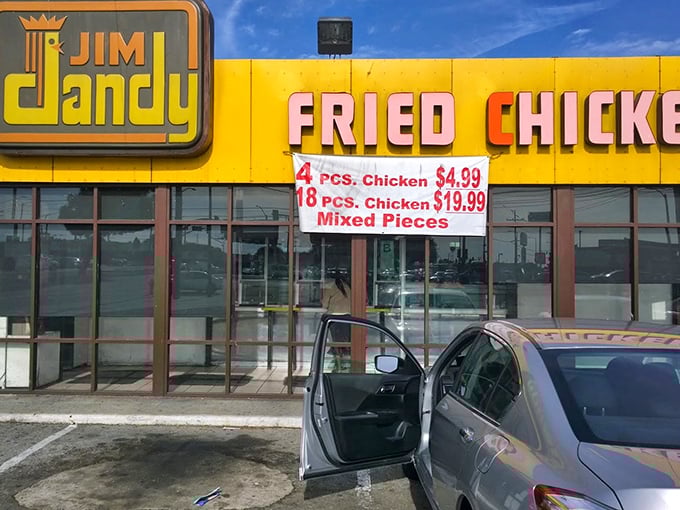 That yellow sign isn't whispering—it's announcing crispy chicken excellence with the confidence of a seasoned soul food champion.